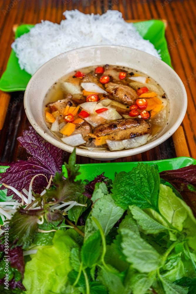 Barbecue cooking on fire - the ingredient of "bun cha", the famous ...