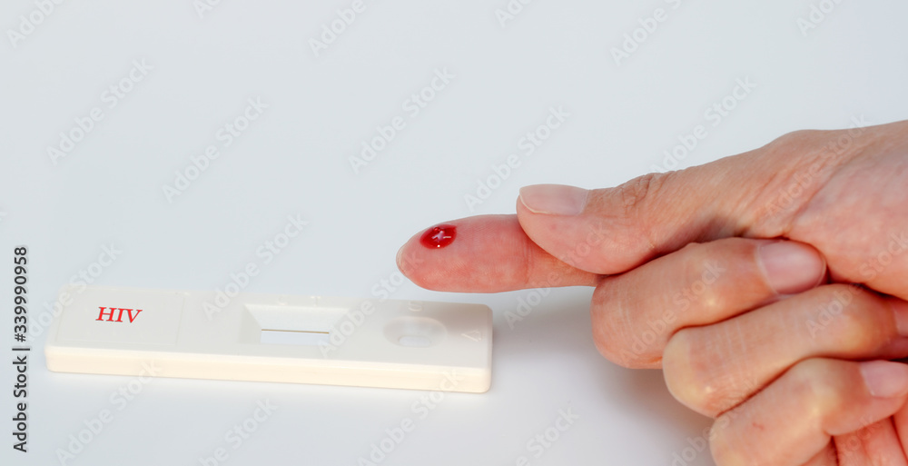 Rapid test kit for HIV, white background,Blood on the finger Stock ...