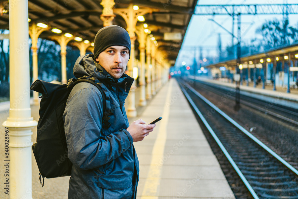 Foto de Sopot Fast Urban Railway station. young man standing and ...