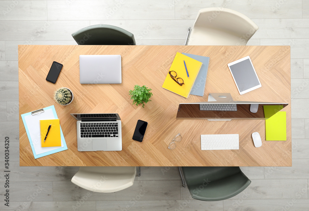 Modern office table with devices and chairs, top view Stock Photo ...