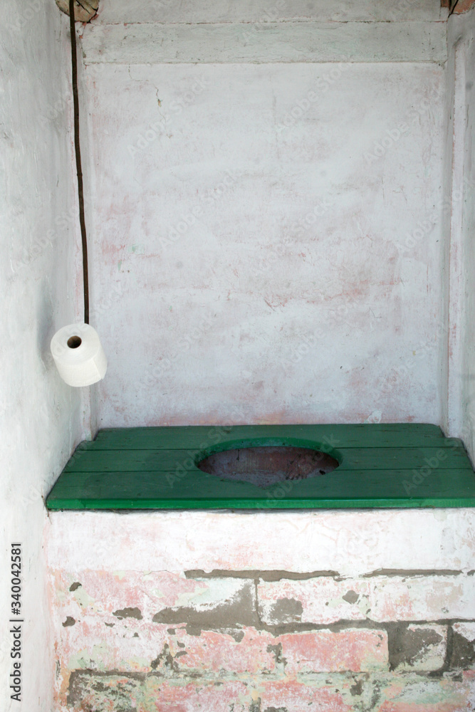 Rural outbuilding. A typical old fashioned WC, outhouse on an old farm ...