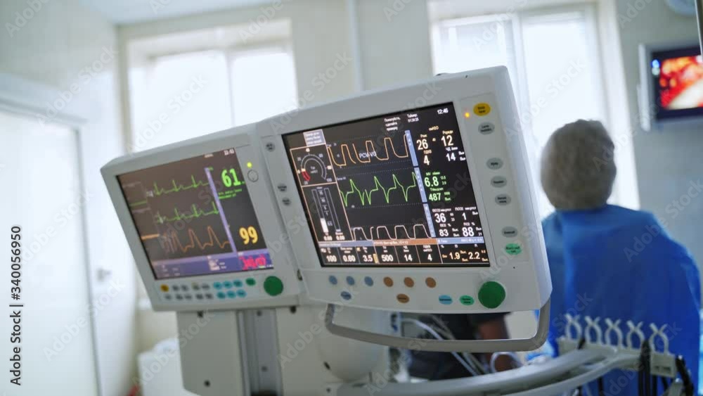 Medical equipment in the operating room. Modern monitors show the ...