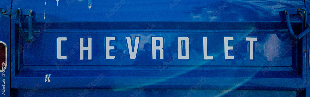 Chevrolet Logo Wordmark on Tailgate of Classic Vintage Blue Pickup ...