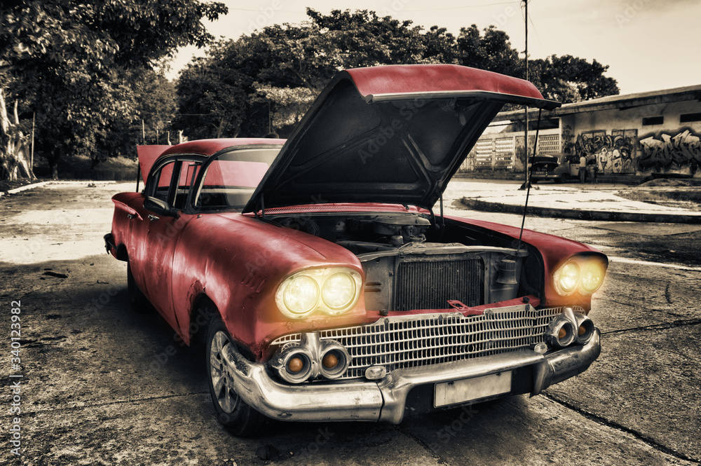 Old red car parked with the hood open and engine problems Stock Photo ...