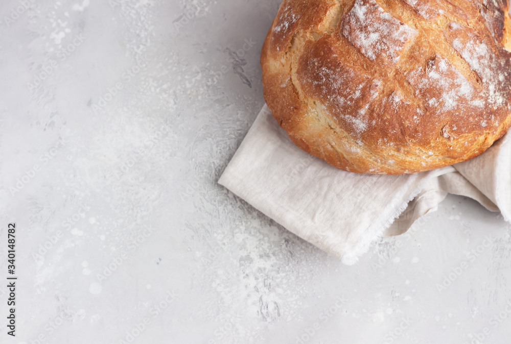 Round loaf of freshly backed artisan sourdough bread. No knead bread ...
