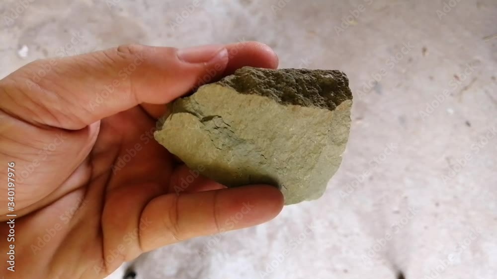 Video Stock Shale stone in a hand. Shale is a fine-grained sedimentary ...