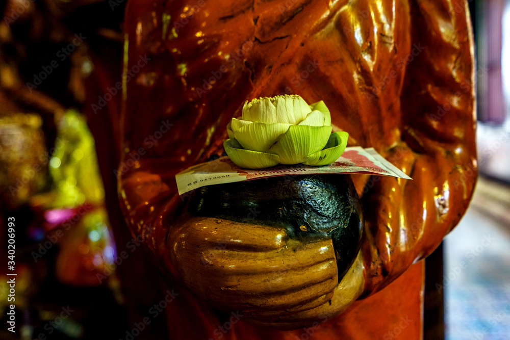 Inside and outside the Wat Phnom temple in Phnom Penh, Cambodia ...