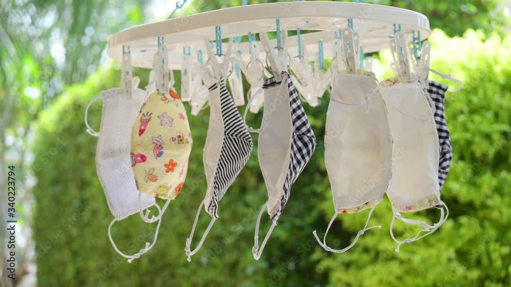 washing clean fabric mask hanging dry disinfect for wearing reuse Stock ...
