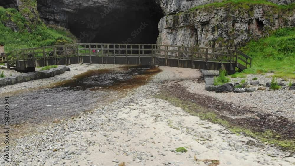 Aerial footage revealing Scotlands famous Smoo Caves boasting one of ...