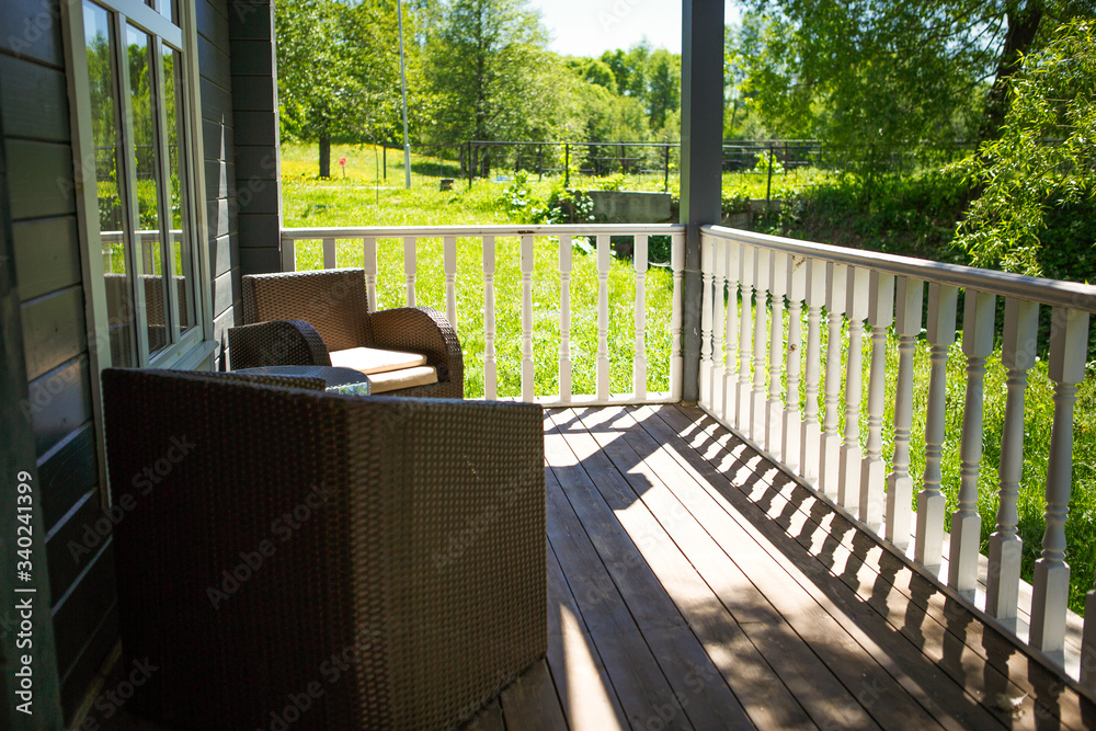 Foto de View from the terrace of a country wooden house to the garden ...