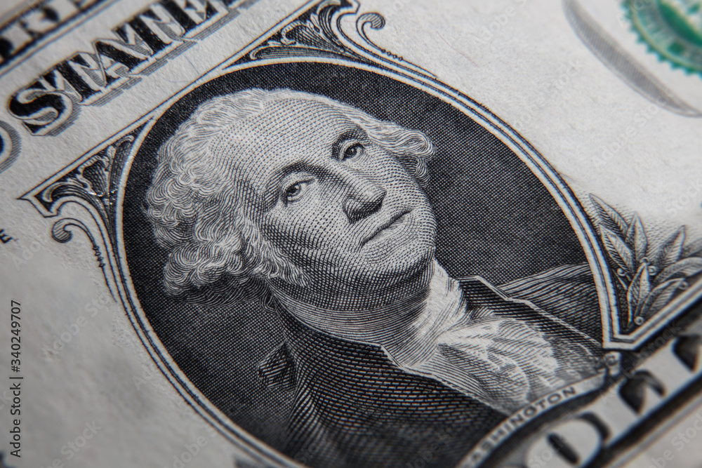 Macro photography of a 1 US dollar banknote. Close up of a one American ...