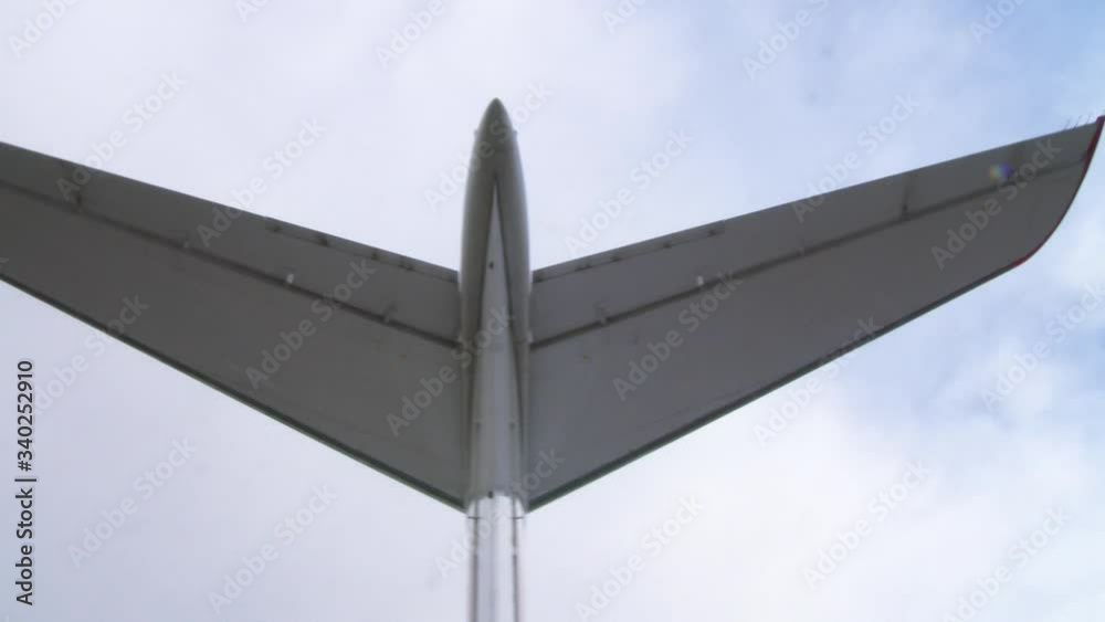 Circular panning shot of an aircraft tail looking upwards. Aircraft ...