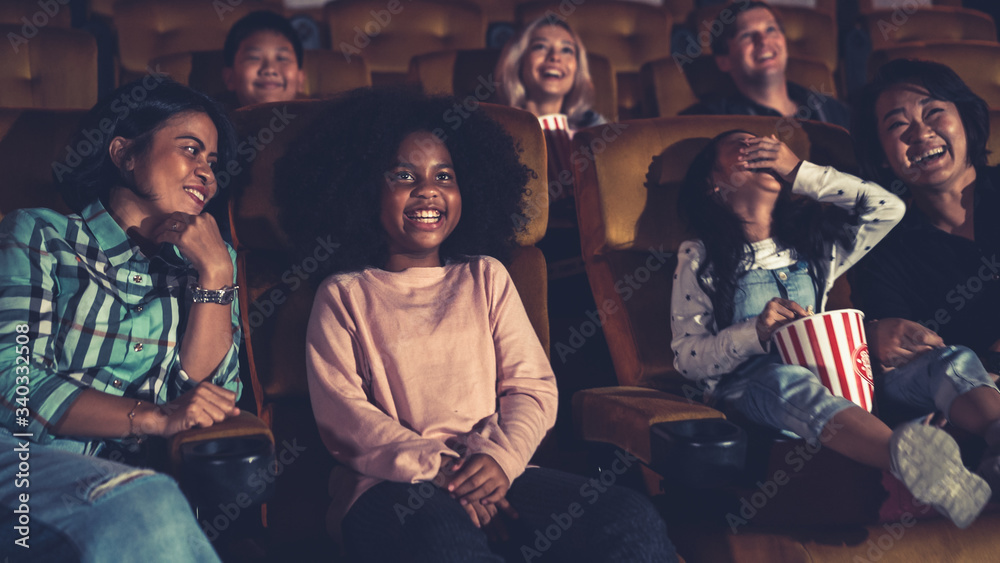 People audience watching movie in the movie theater cinema. Group ...