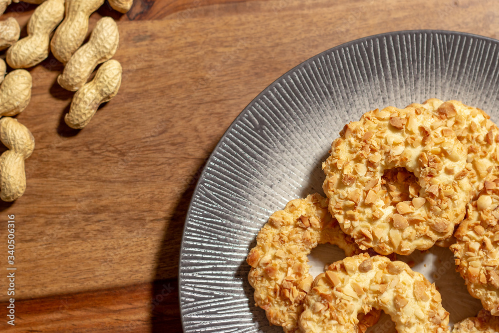 sable biscuits with chopped peanuts on top Stock Photo | Adobe Stock