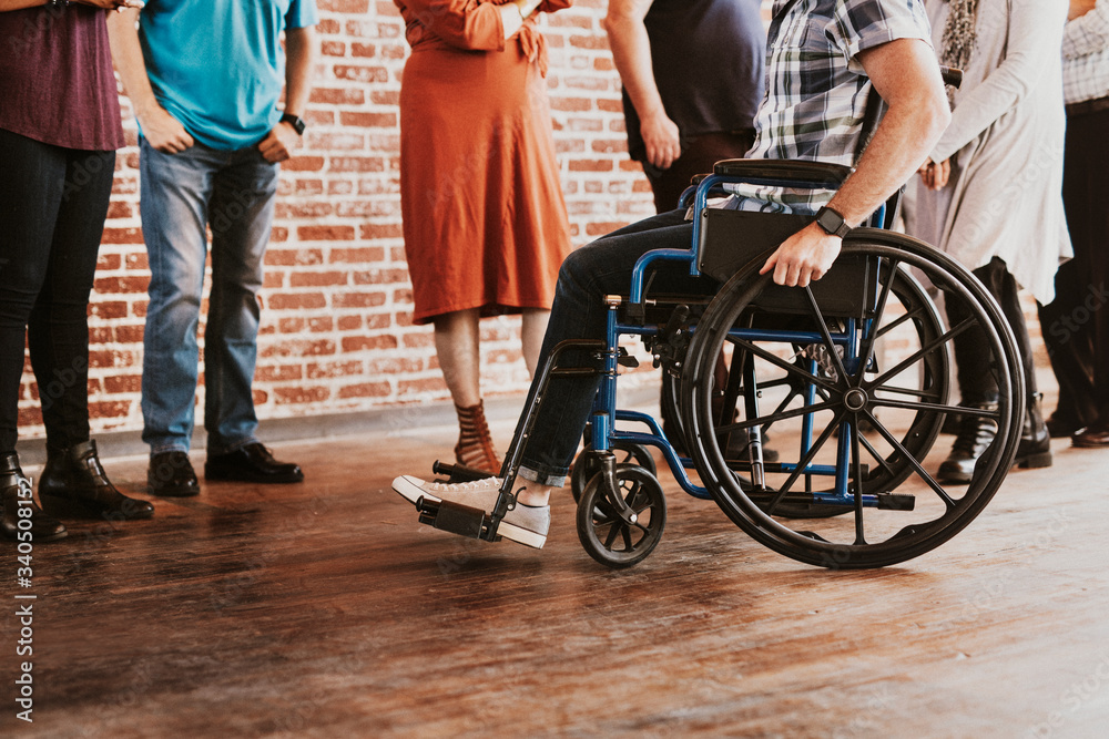 Handicapped man in a seminar Stock Photo | Adobe Stock