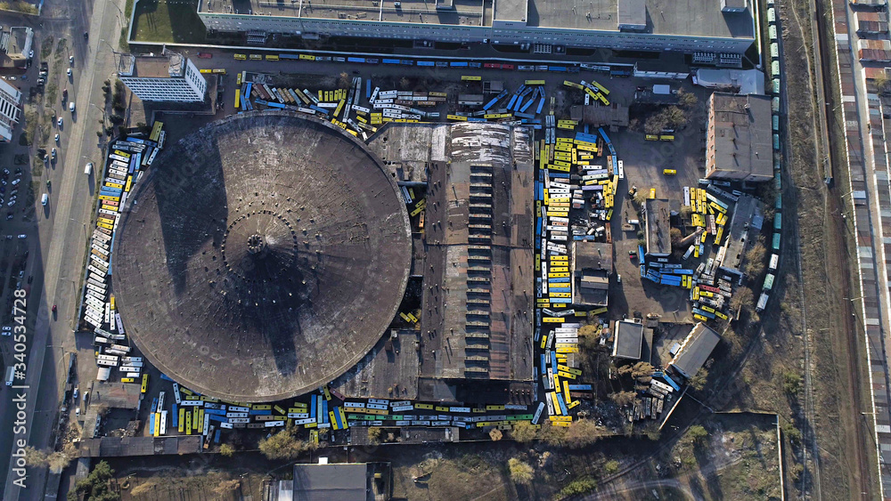 Aerial footage. Broken, destroyed, abandoned buses. Buses graveyard ...