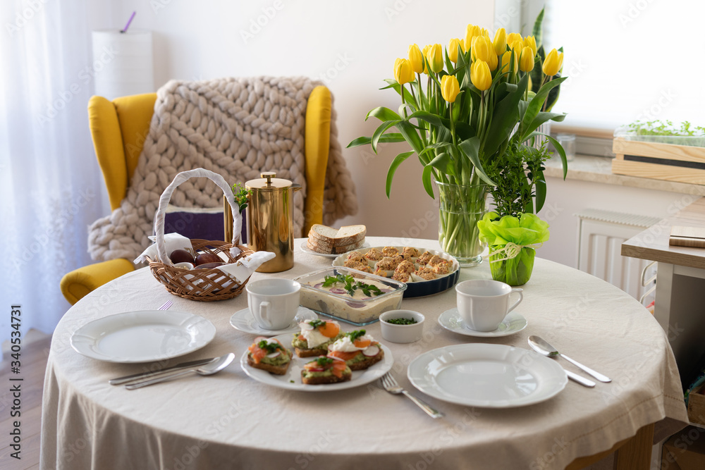 Festive Easter table setting with traditional meals. Easter breakfast ...