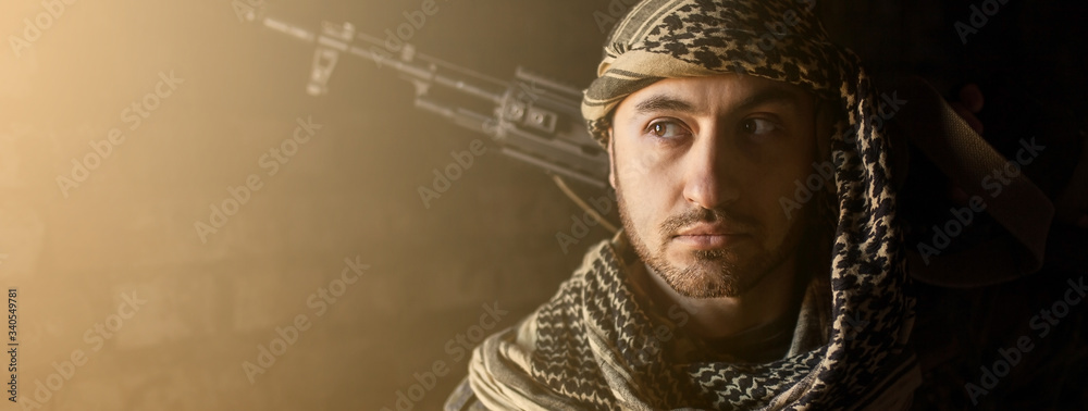 Arab male soldier in a headdress from the national keffiyeh with a ...