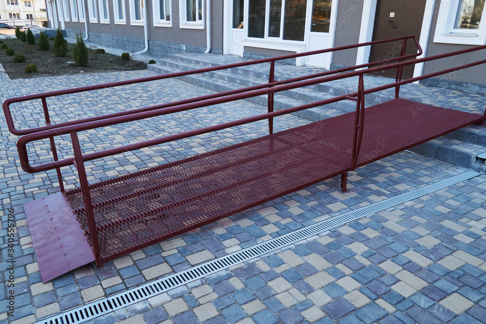 Wheelchair access ramp for entrance of residential multistory building ...