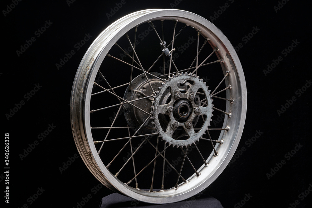 the rear wheel of a motorcycle without a tire, with a motorcycle ...
