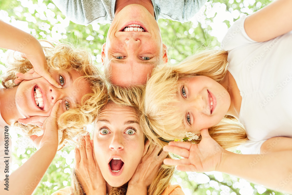 Family and children make faces Stock Photo | Adobe Stock
