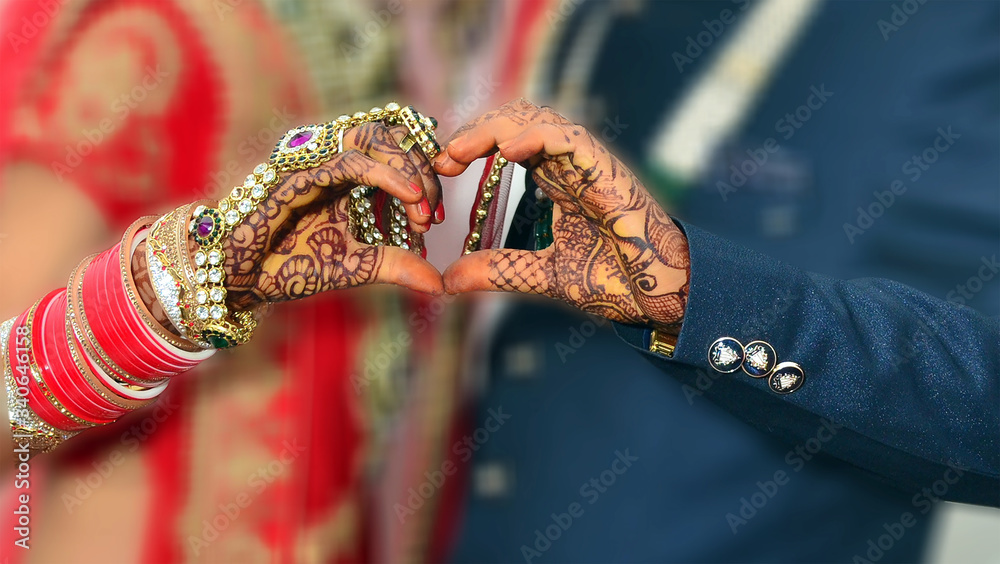Indian bride and groom hand in traditional clothing Stock Photo | Adobe ...