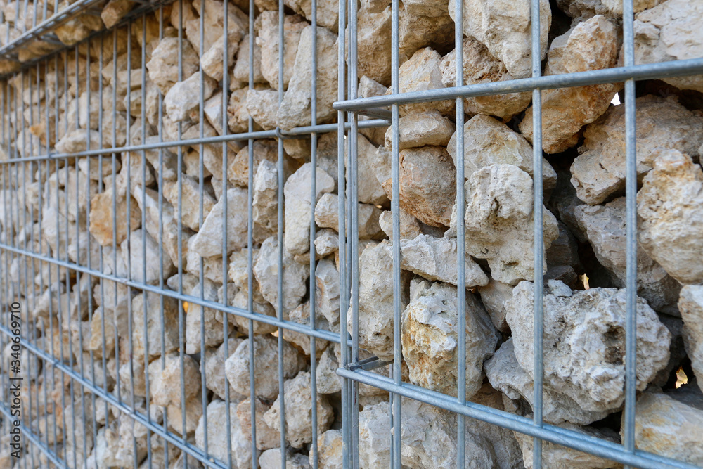 Gabion wire mesh wall Stock Photo | Adobe Stock
