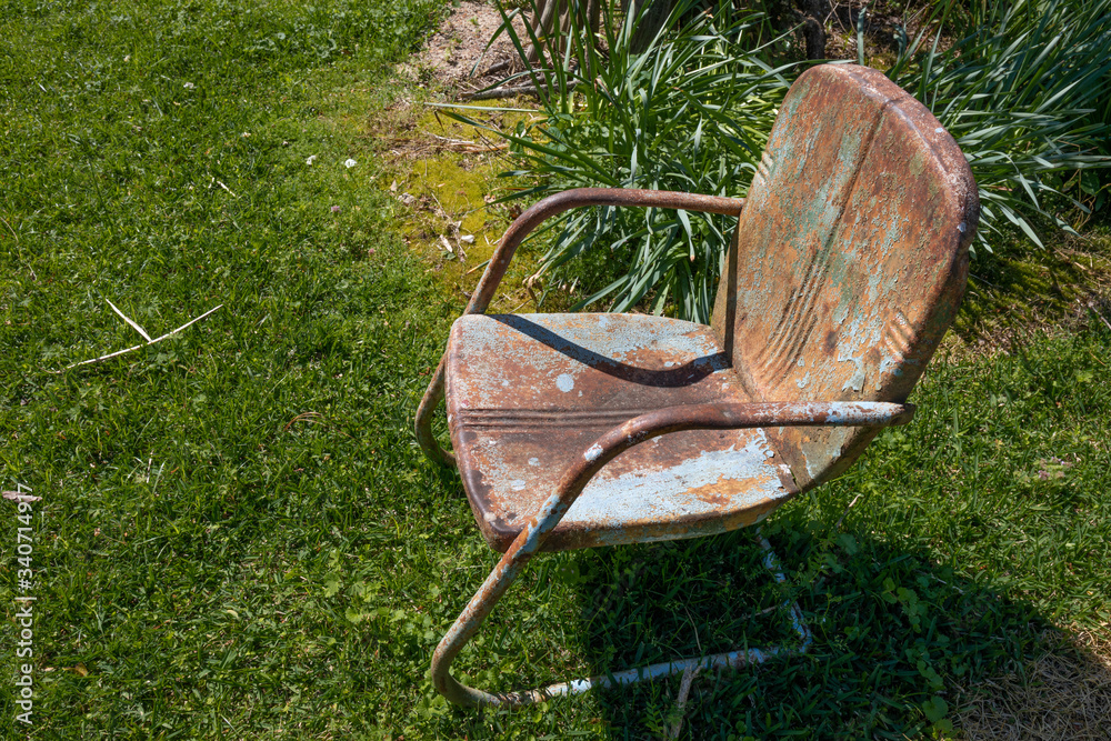 Old and rusty empty chair, death loss and grief metaphor, horizontal ...