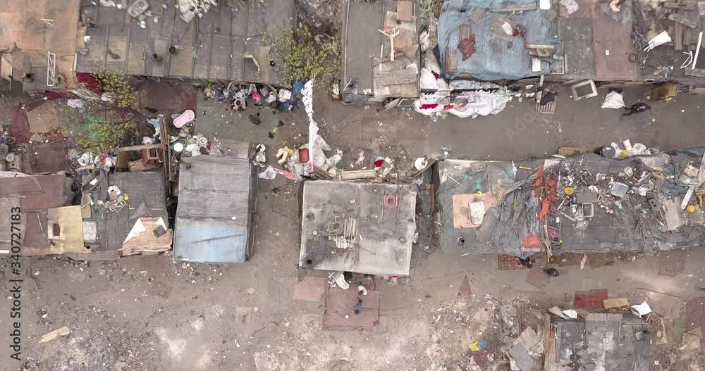 Aerial top-down view high altitude of slum a heavily populated urban ...