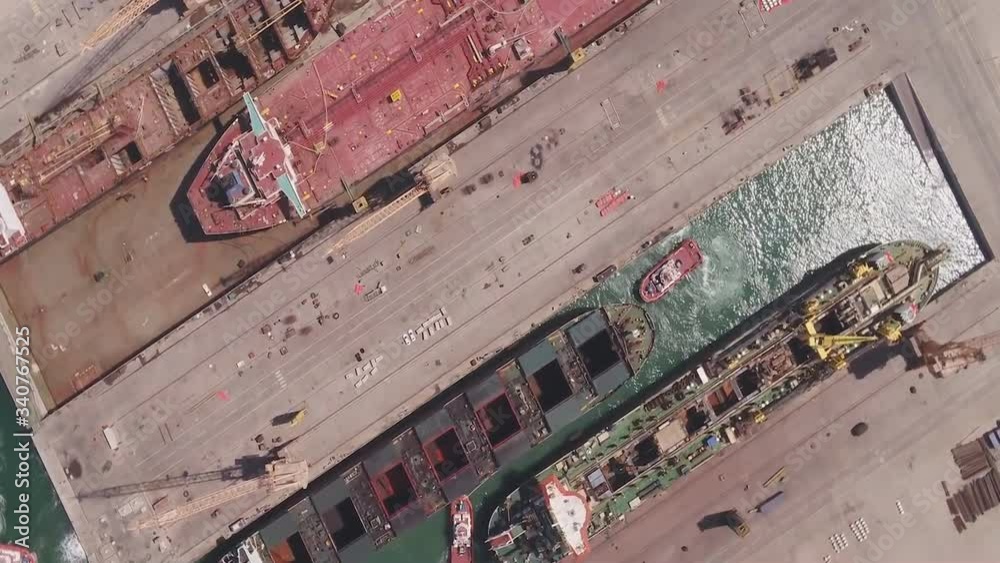 Aerial view of a shipyard in Oman. Oman Drydock Company (ODC) is one of ...