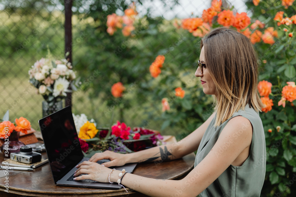 Laptop in the garden Stock Photo | Adobe Stock