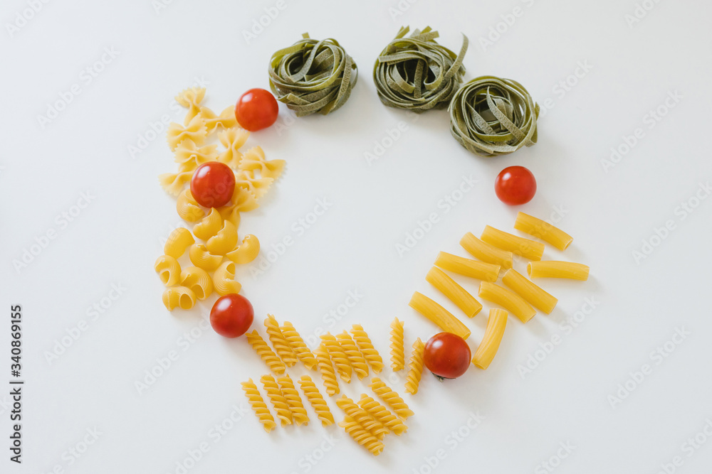 Variety of types and shapes of Italian pasta in rows on white ...