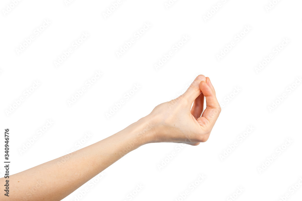 Woman bunching her fingers together, with tips touching and pointing ...