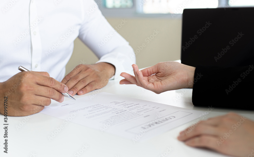 Approving and signing contracts concept, New employees are approved to ...
