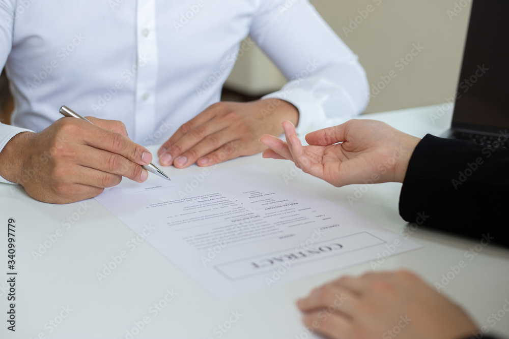 Approving and signing contracts concept, New employees are approved to ...