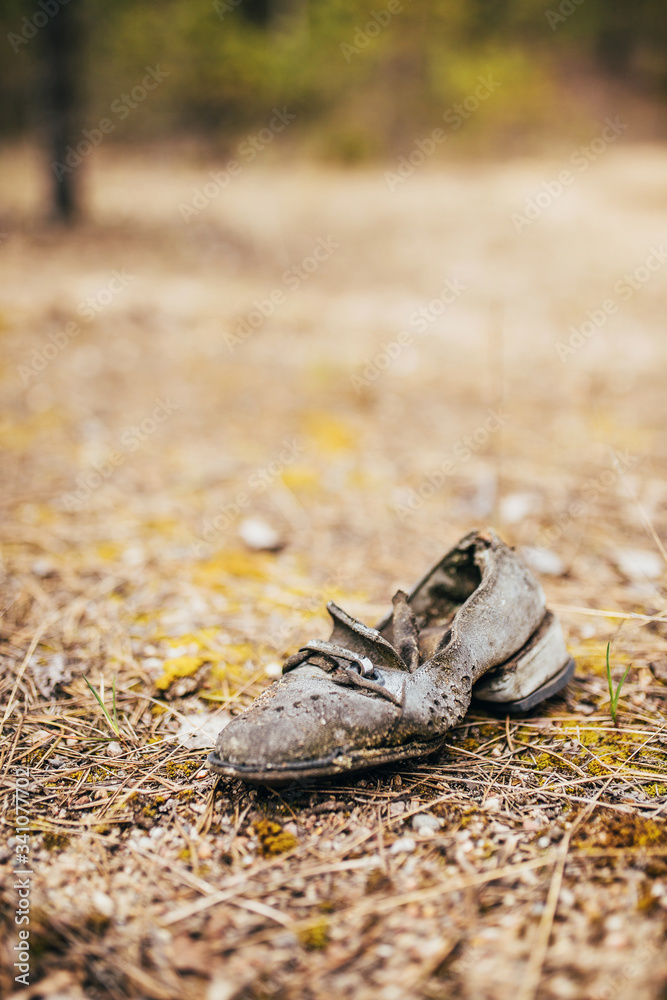 Old ragged female boot - trash in the forest - crime scene evidence ...