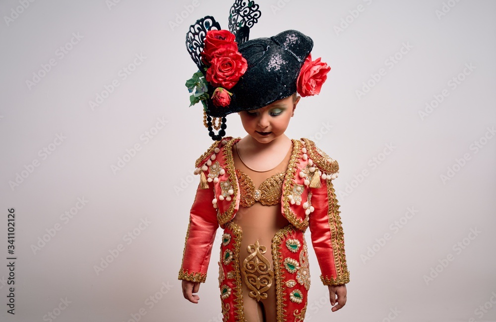 Young little caucasian kid girl wearing bullfighter traditional folkore ...