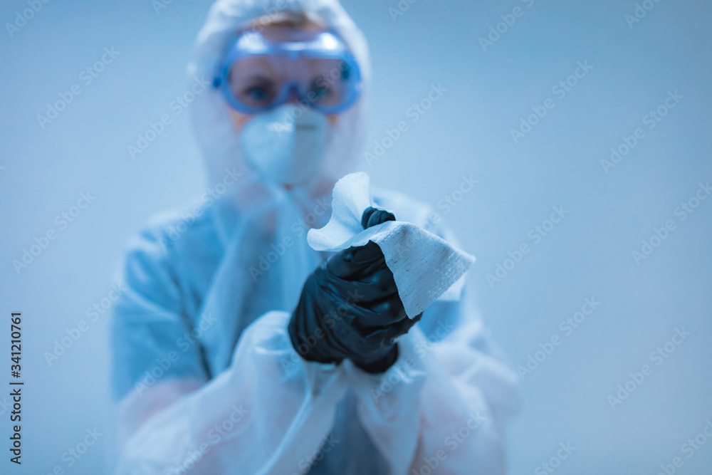 Medical doctor, scientist in full body suit for prevention from viruses ...