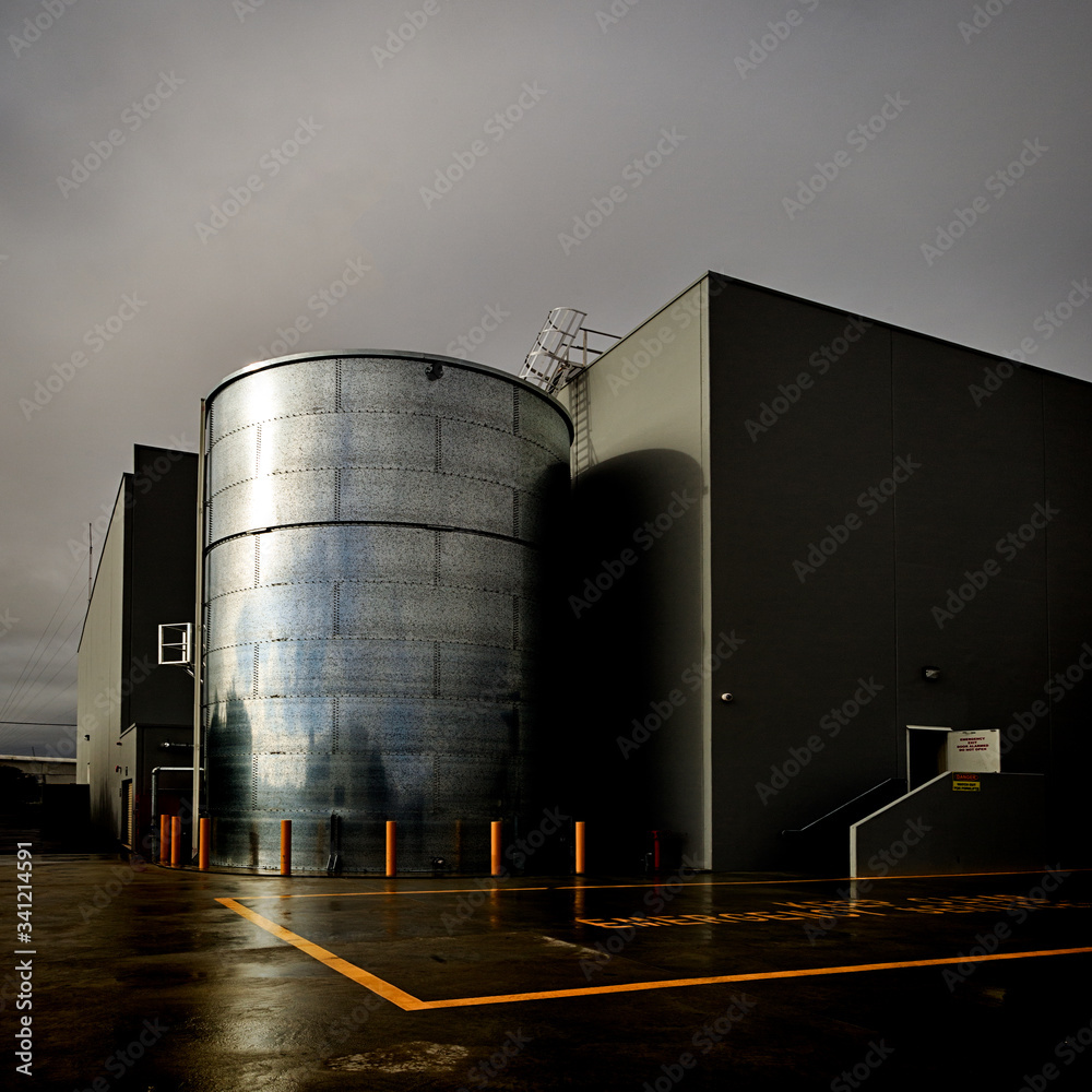 Water storage tank at a warehouse on an industrial park Stock Photo ...