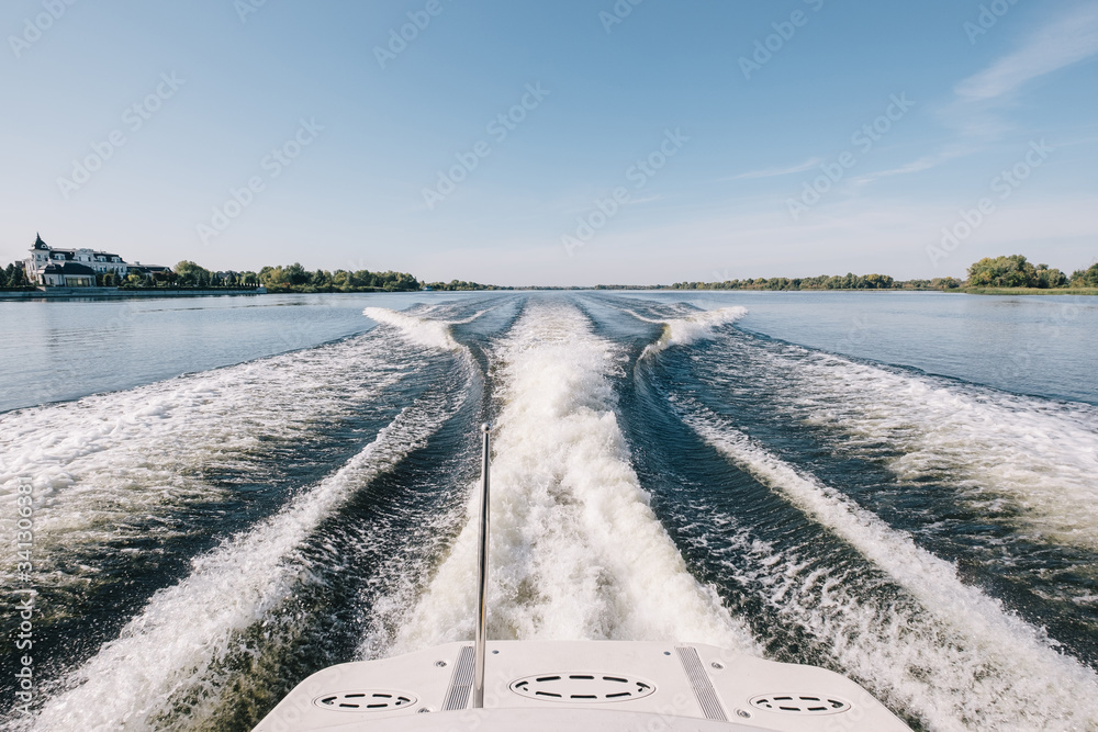 Trace tail of speed boat on water surface in the sea- natural and ...