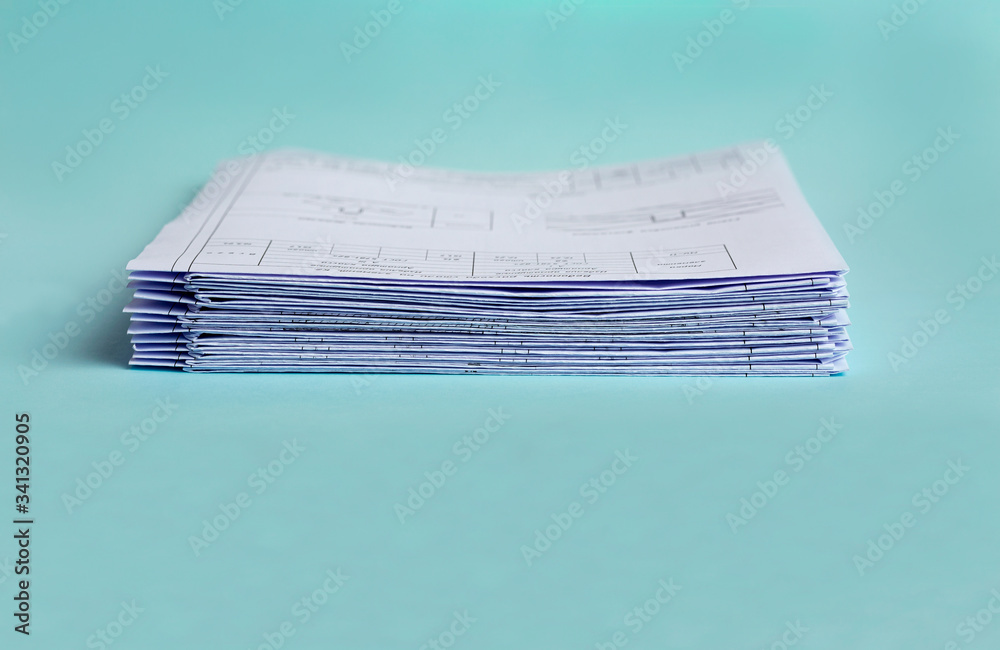 Stack Folding architecture drawings on a blue background. Copy space ...