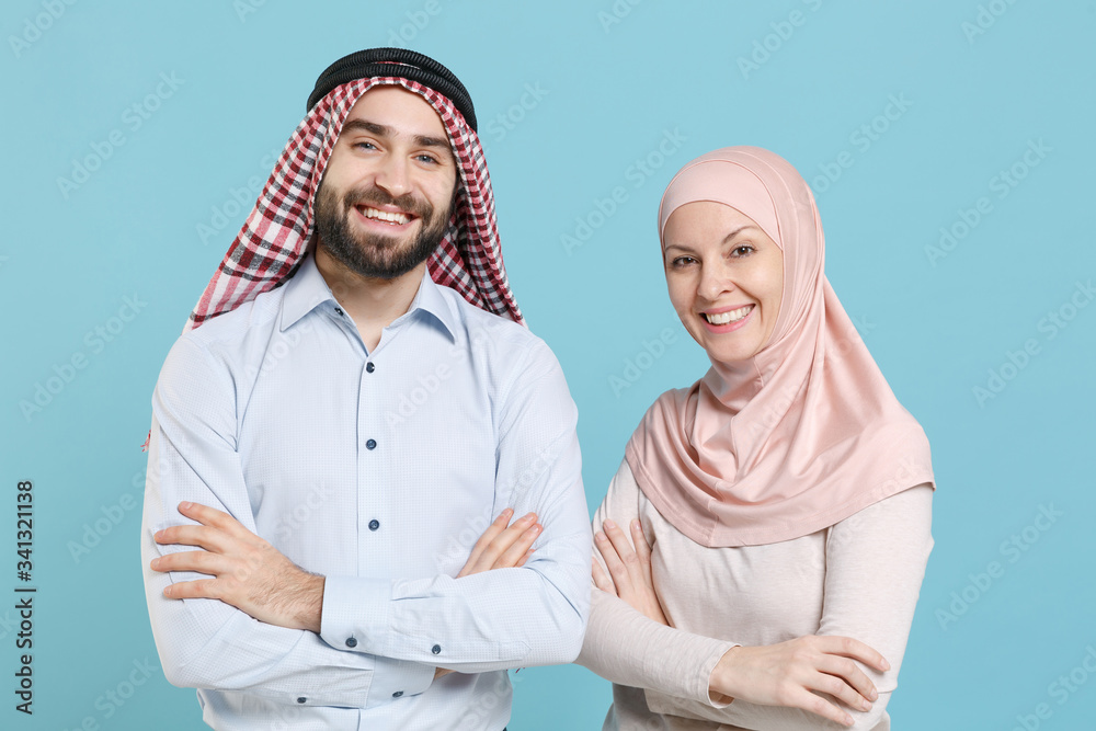 Smiling young couple friends arabian muslim man wonam in keffiyeh ...
