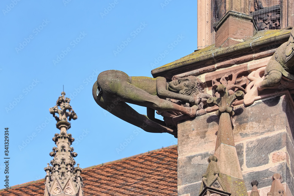 Freiburg im Breisgau, Germany. Mooning gargoyle of Freiburg Minster ...