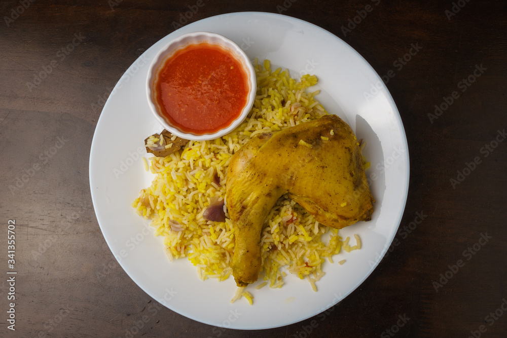 arabic chicken mandi rice on wooden dine table. top view Stock Photo ...
