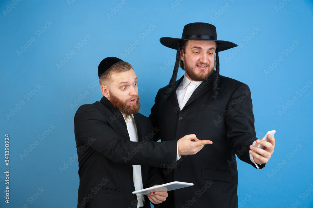 Pointing, choosing. Portrait of a young orthodox jewish men isolated on ...