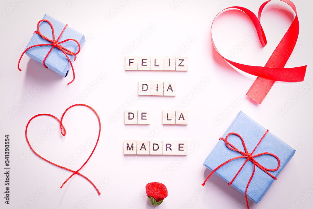 Happy Mother's Day greeting card with red hearts, blue gift boxes and ...