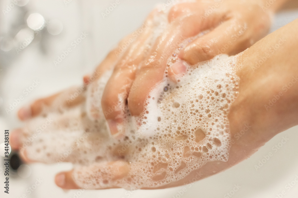 Washing hands. Hands washing with antibacterial soap in proper ...