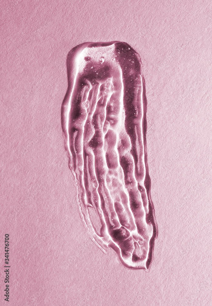 Transparent gel with bubbles close-up. Smear of face gel cream. The ...