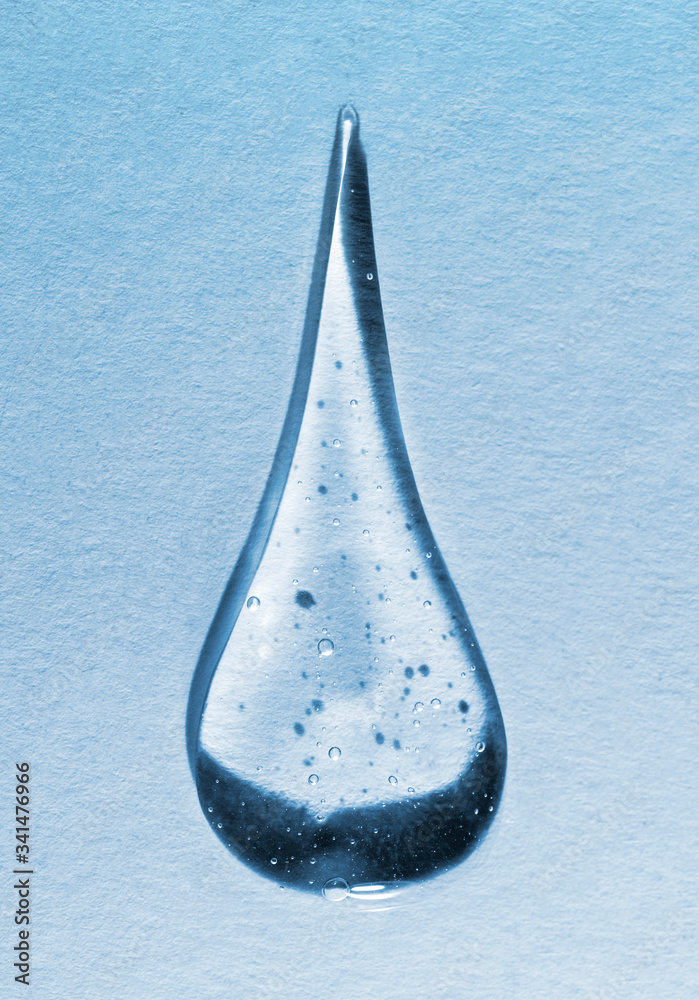 Transparent gel with bubbles close-up. Smear of face gel cream. The ...