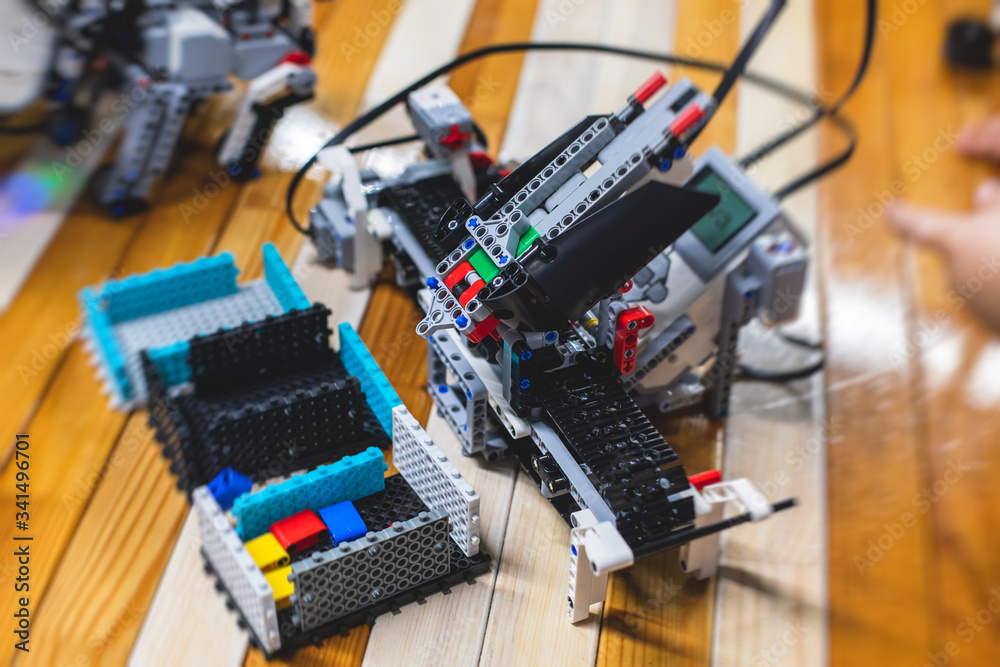 Group of children kids playing with robotic vehicle model, science ...